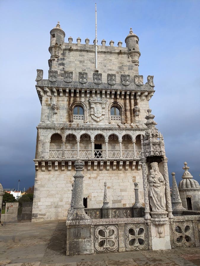 An Ornate Building with Statues on the Outside and in Front of it Stock ...