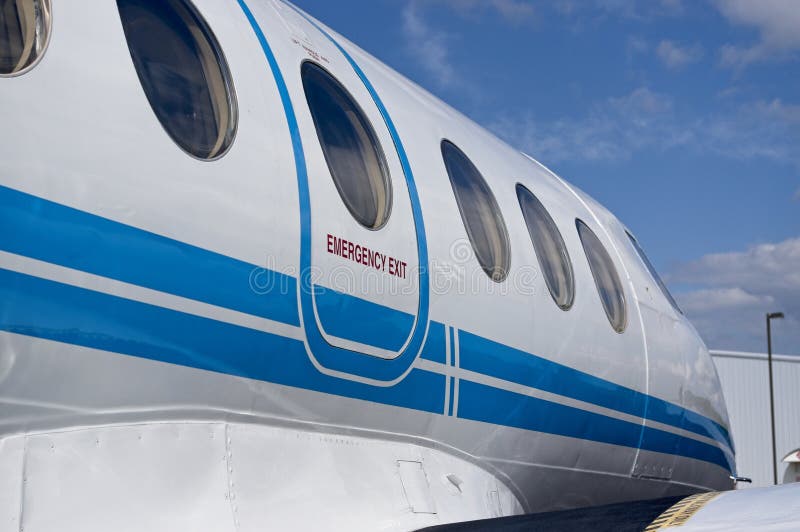 Emergency Exit Door on the Side of a Passenger Plane Stock Photo ...