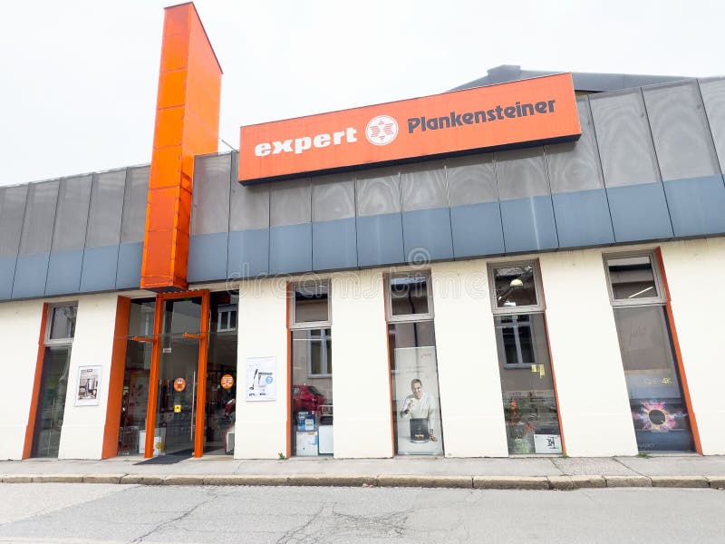 Exterior of Expert Plankensteiner Electronics Store with Modern Signage ...