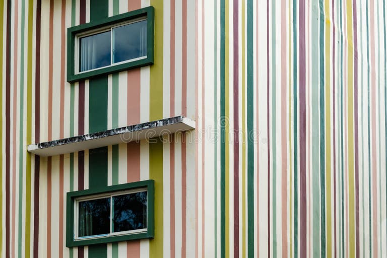 Colorful Striped Building Facade with Windows Stock Image - Image of ...