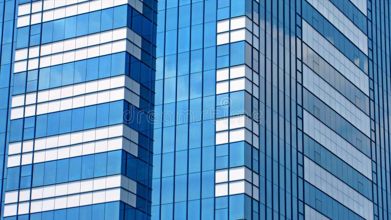 Exterior of a Modern Building with Sky Blue and White Glass Windows ...
