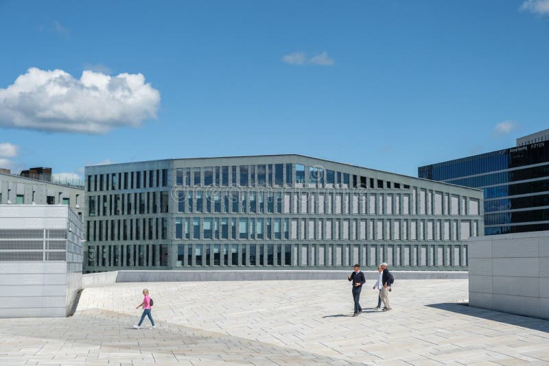 Exterior of the Oslo Opera Building and Tourists Walking on the ...