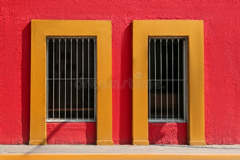 Exterior of Red Building with Windows and Steel Grilles Stock Photo ...