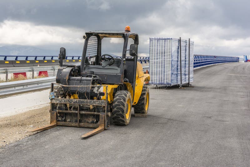 Exterior Small Forklift at Road Construction Works Stock Image - Image ...
