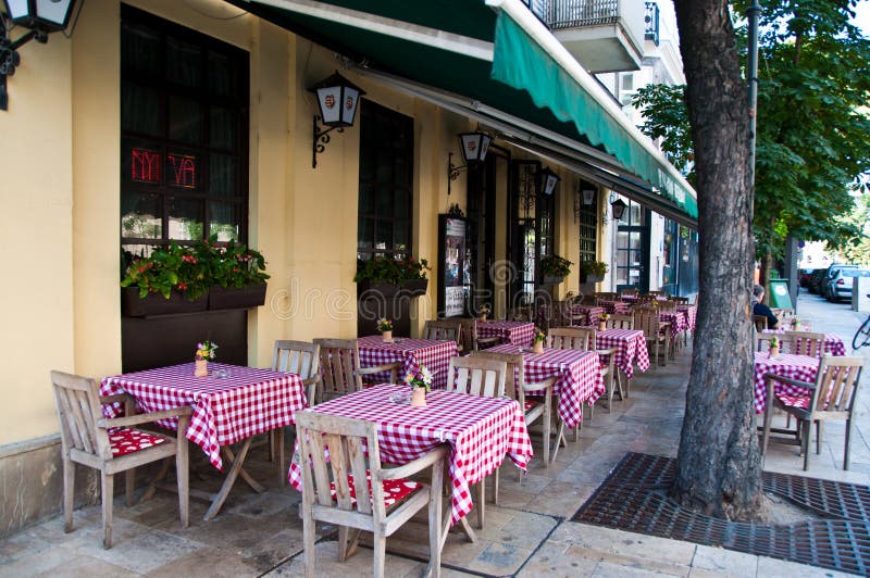 Exterior Tables On A Local Cafe Or Restaurant Stock Photo - Image of ...