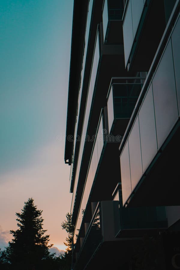 Exterior View of a Modern Office Building at Sunset Stock Image - Image ...