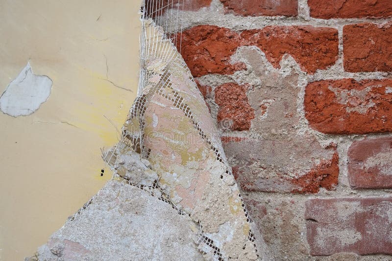 Exterior Wall of a Building with Damaged Stucco. Demonstration of Poor ...