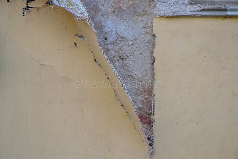 Exterior Wall of a Building with Damaged Stucco. Demonstration of Poor ...