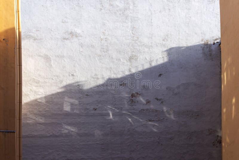 Exterior Wall of a House with Reflections of Windows in an Old ...