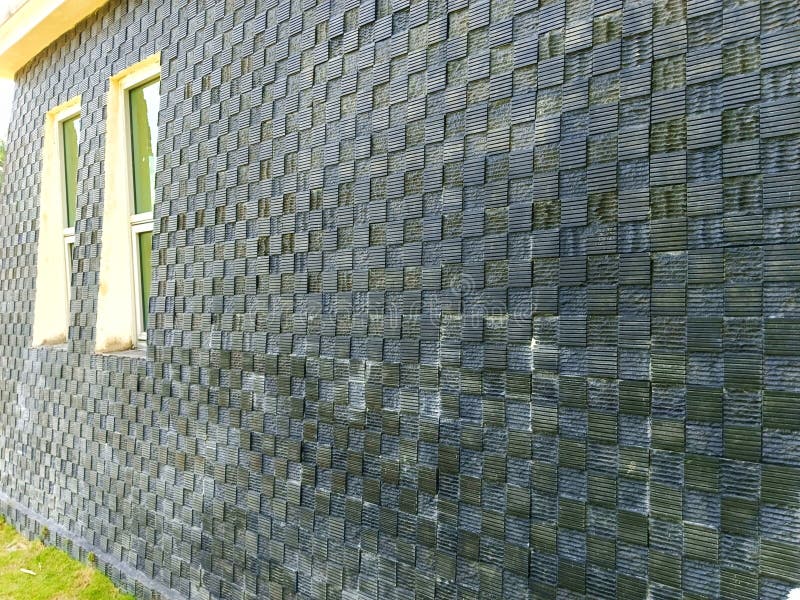 Exterior Wall with Textured Stone Blocks and Window Detail Stock Photo ...