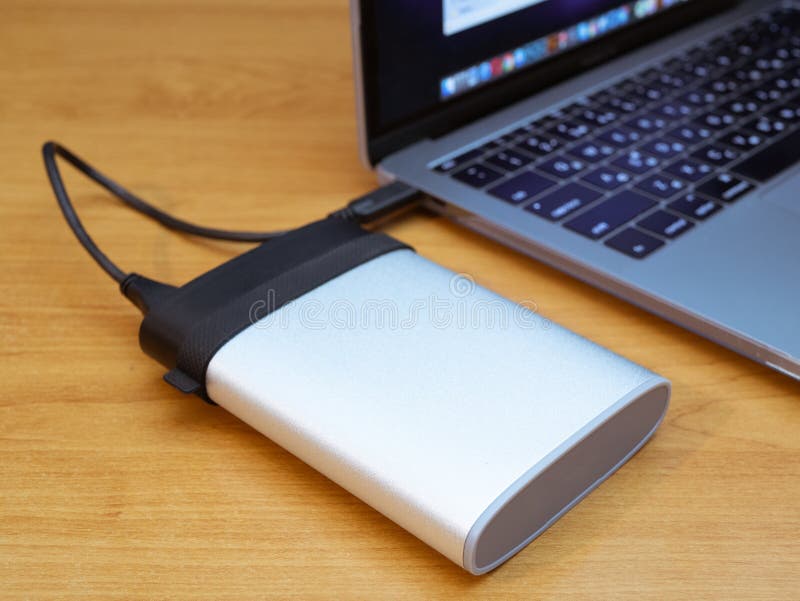 External Disk Drive Connected To Laptop by Wire Stock Image - Image of ...