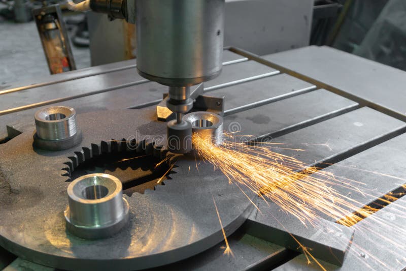 Gear Grinding Machine in Operation, Grinding of Teeth of a Wheel with ...