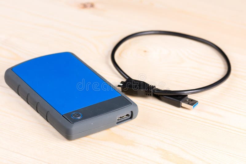 External Hard Disc Hdd with Usb Cable on the Wooden Board Table Stock ...