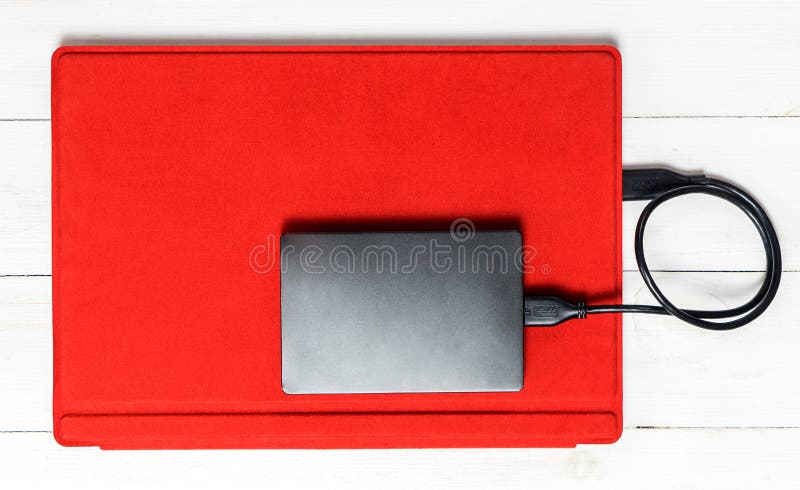 External Hard Disk on Red Tablet Computer Stock Image - Image of table ...