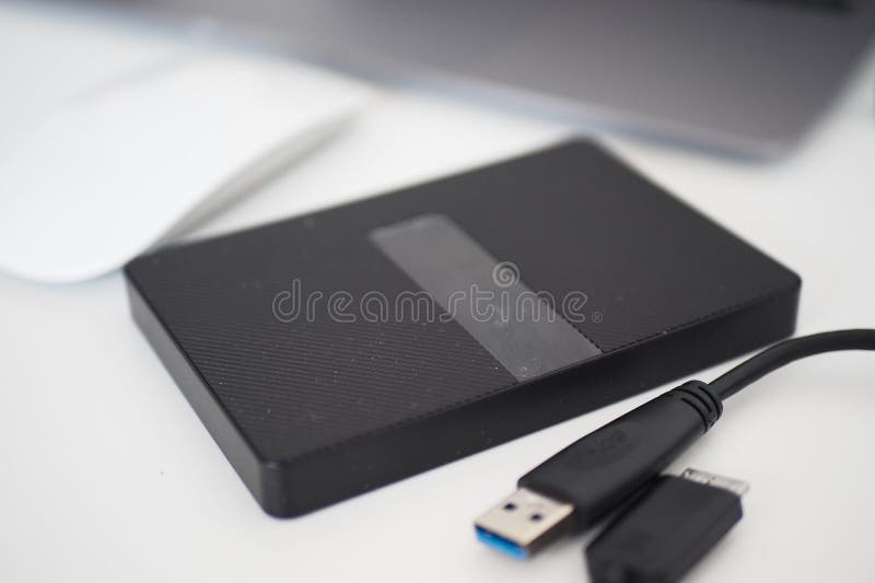 External Hard Drive on a Laptop Stock Photo - Image of processor ...