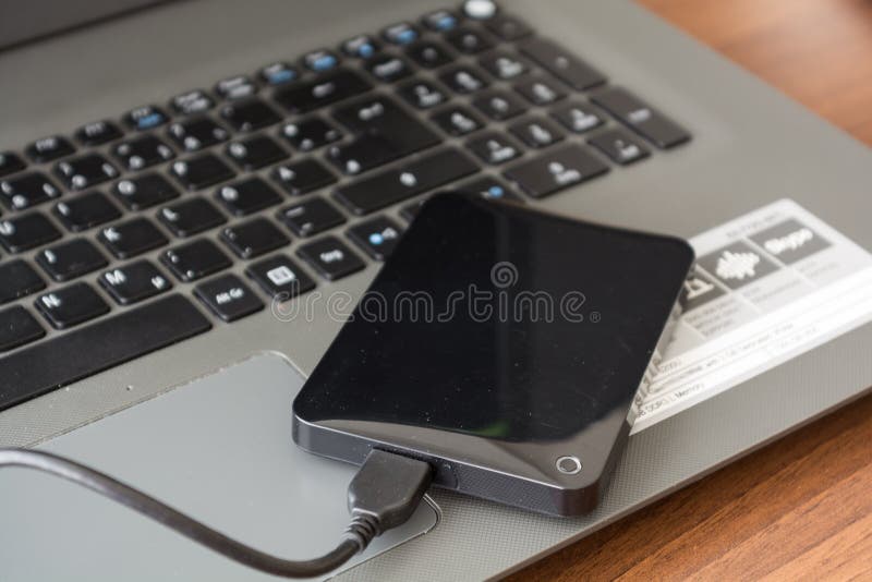 External Hard Drive and Laptop - Closeup Stock Image - Image of ...
