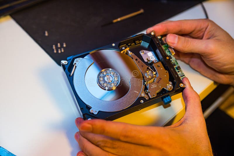 External Hard Drive Open for Reparation in Mens Hand Stock Image ...