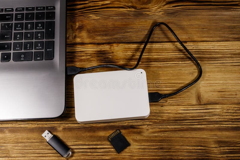 External HDD Connected To Laptop Computer, SD Memory Card and USB Flash ...