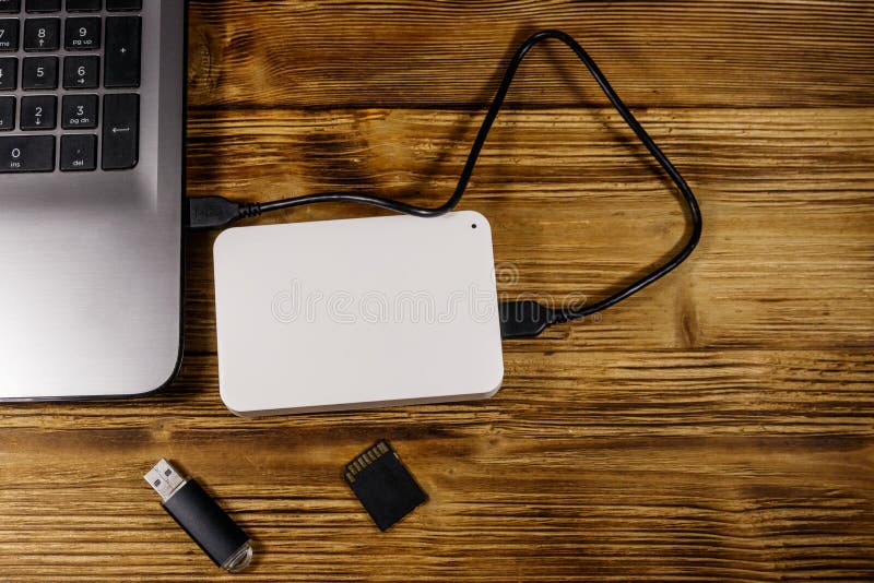 External HDD Connected To Laptop Computer, SD Memory Card and USB Flash ...