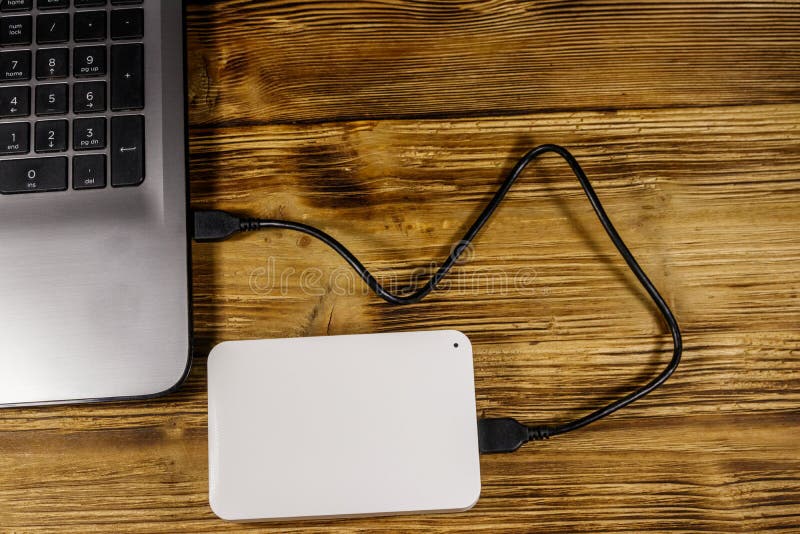 External HDD Connected To Laptop Computer, SD Memory Card and USB Flash ...