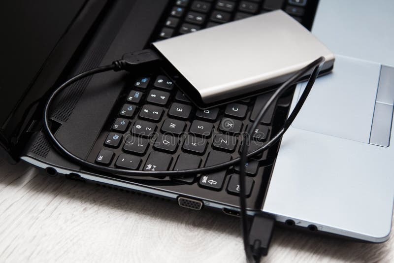 External HDD and laptop stock photo. Image of digital - 57777910