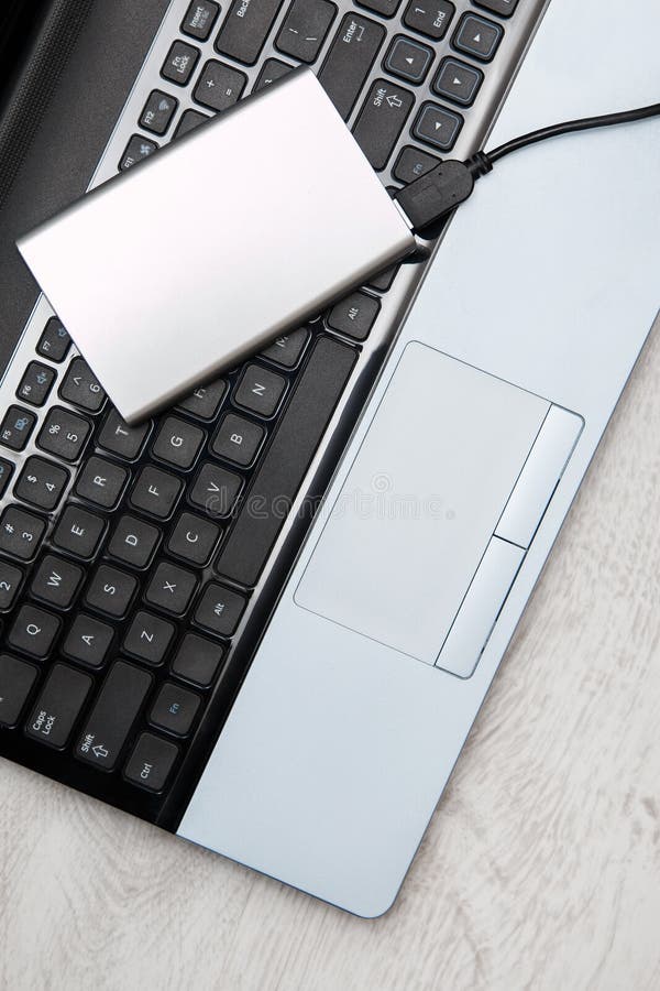 External HDD and laptop stock image. Image of removable - 57778341