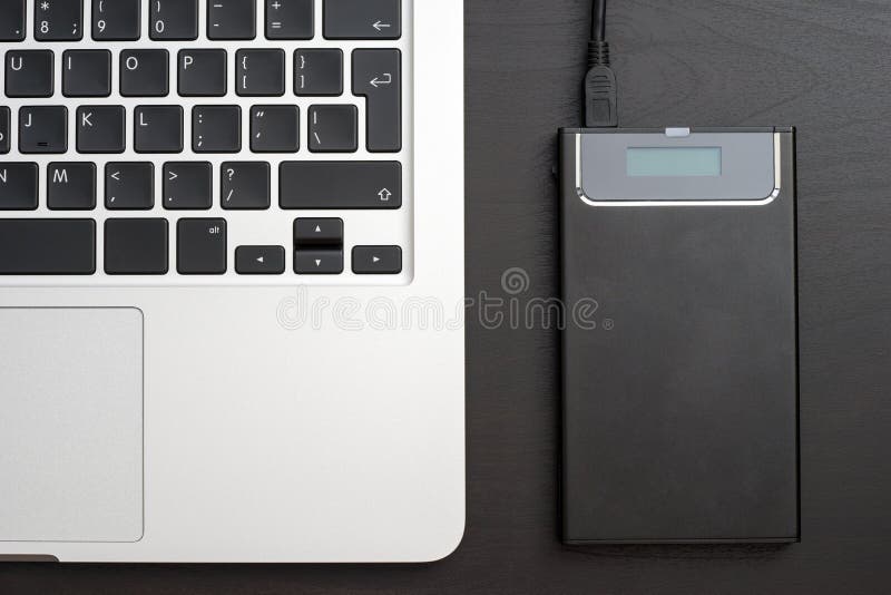 External HDD over laptop stock image. Image of media - 76158045