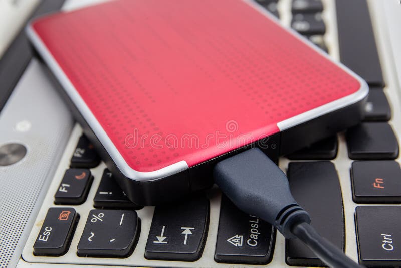 External HDD Over Notebook Keyboard Stock Photo - Image of laptop ...