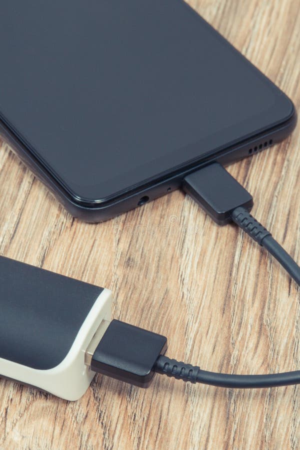 External Powerbank Charging Battery of Smartphone or Mobile Phone Stock ...