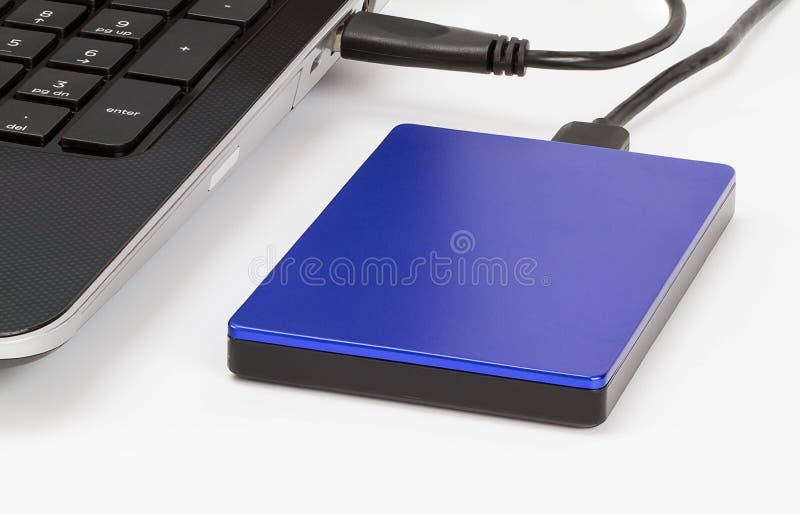External Storage Connected To Laptop by Usb Cable on White Desk Stock ...