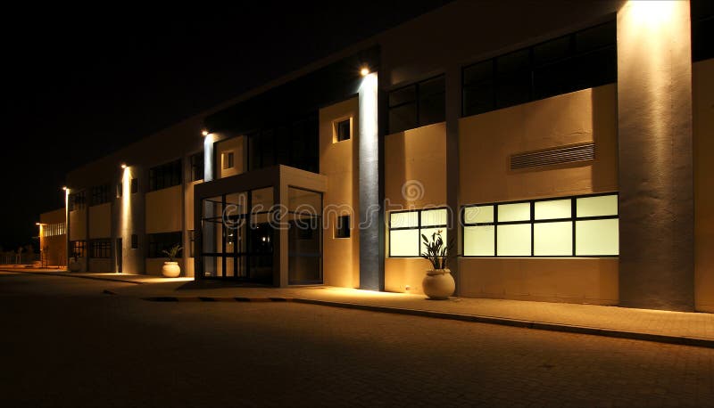 External Wide Angle View of Modern Warehouse at Night Stock Photo ...