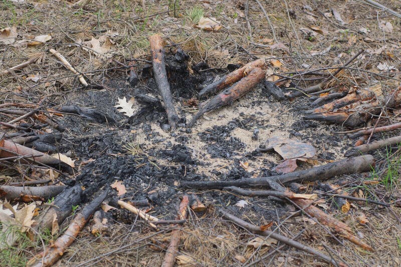 An Extinct Fire Made of Black Ash and Ash on the Brown Ground Stock ...