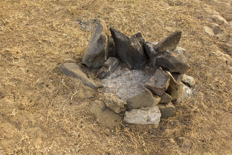 Extinct Stone Campfire with Ash on the Sand with Dry Grass Stock Photo ...