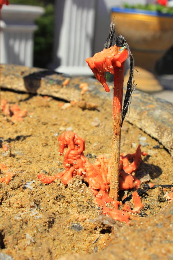 Extinguish red candle stock photo. Image of sand, faith - 63060078