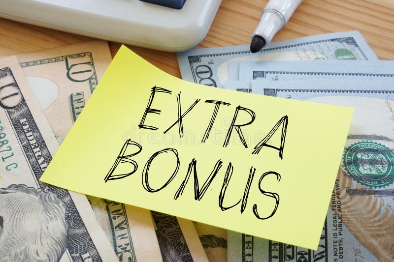 Extra Bonus is Shown Using the Text and Photo of Dollars Stock Photo ...