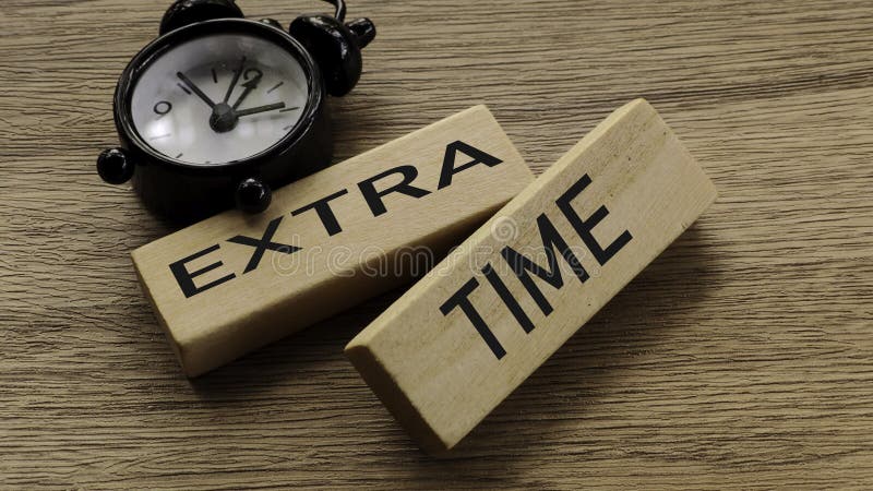 Extra Time Concept with Alarm Clock and Wooden Blocks Stock Photo ...