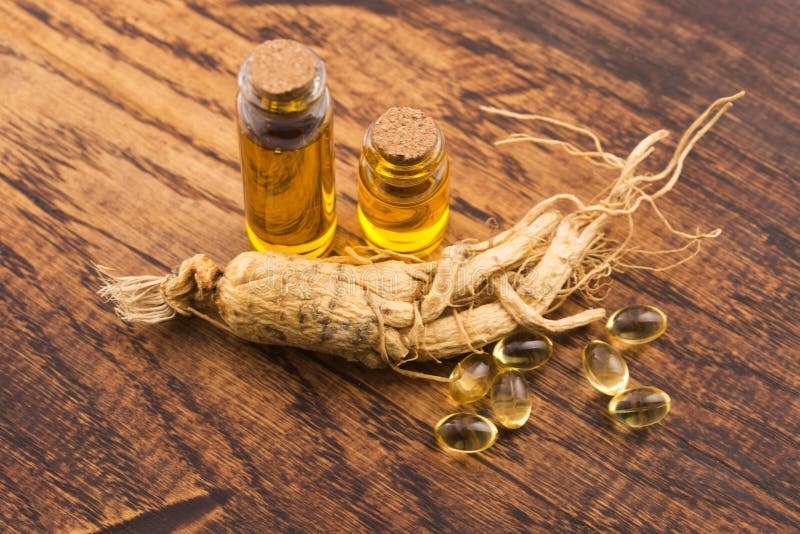 Extract Oil Of Ginseng Root And Ginkgo Biloba Leaves Stock Image ...
