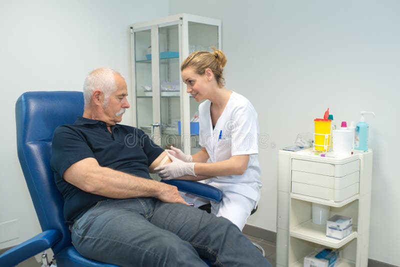 Extracting Blood from Patient Stock Image - Image of male, type: 123598229