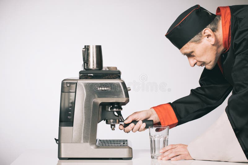 Extracting Coffee and Making Several Hot Drinks in Studio Stock Image ...