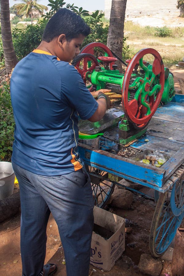 Extracting the Juice from the Raw Sugar Cane Editorial Photography ...