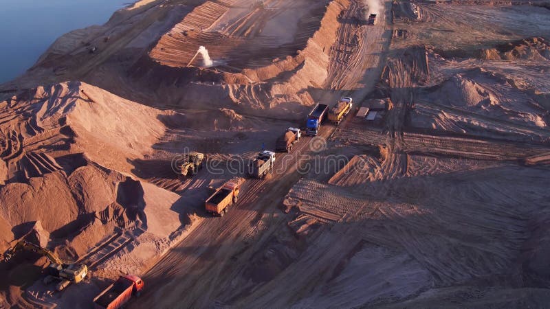 Extraction of Construction Sand at the Quarry. Loading Construction ...
