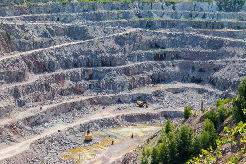 Extraction of Mineral Resources in Granite Quarry Stock Photo - Image ...