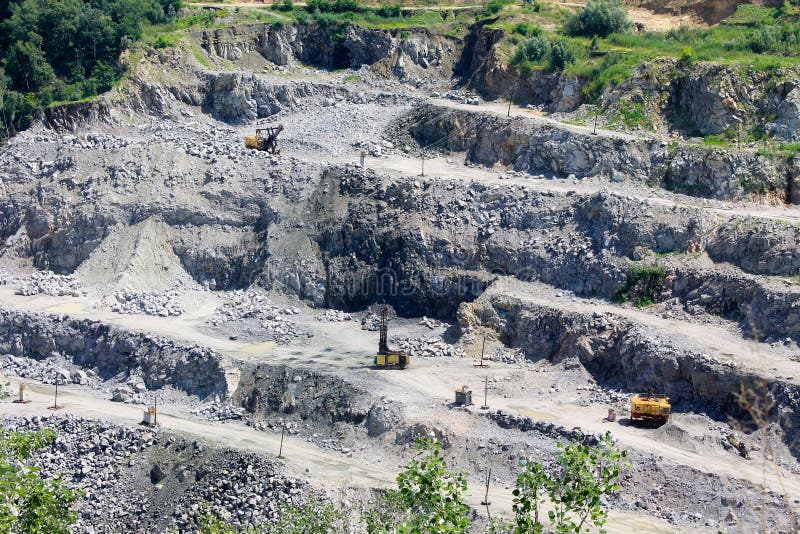 Extraction of Mineral Resources in Granite Quarry Stock Photo - Image ...