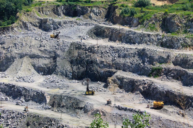 Extraction of Mineral Resources in Granite Quarry Stock Photo - Image ...
