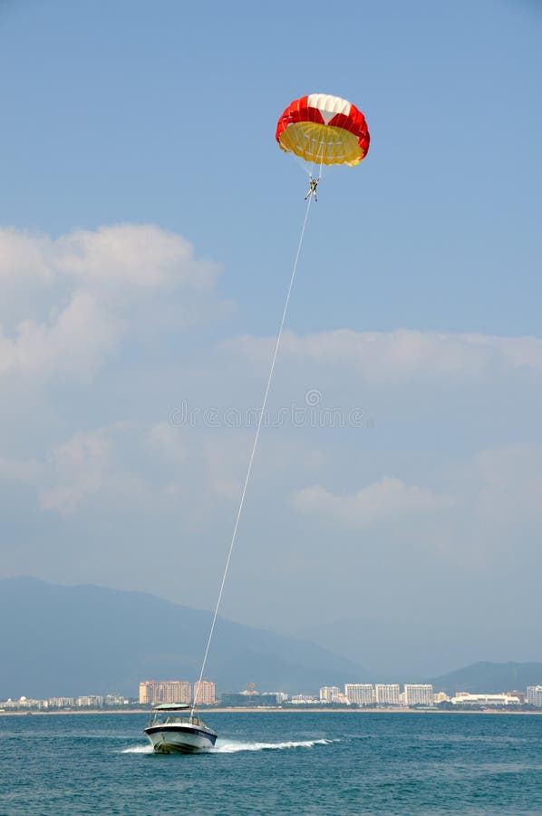 Extraction parachute stock image. Image of blue, boat - 26574783