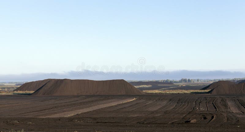 Extraction of peat stock photo. Image of mining, digging - 80289936