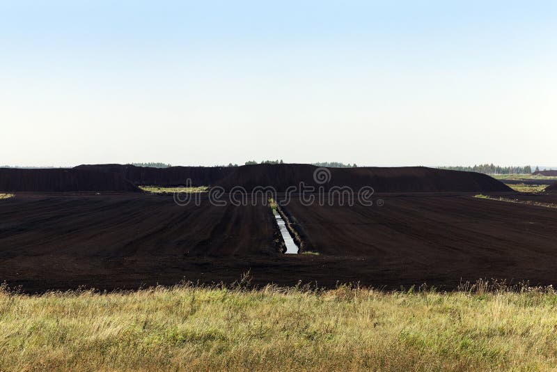 Extraction of peat stock photo. Image of environment - 80290550