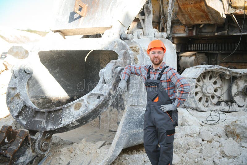 Extraction of Stone. Male Worker Next To Stone Quarry Stock Image ...