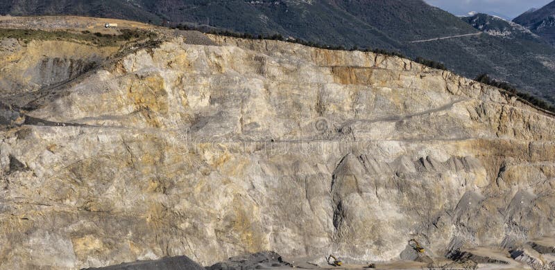 Extraction of Stone in an Outdoor Quarry Stock Photo - Image of ...