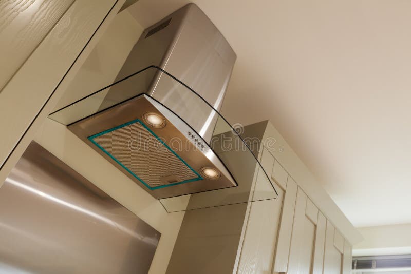 Gas hob and extractor hood stock photo. Image of interior - 106280784